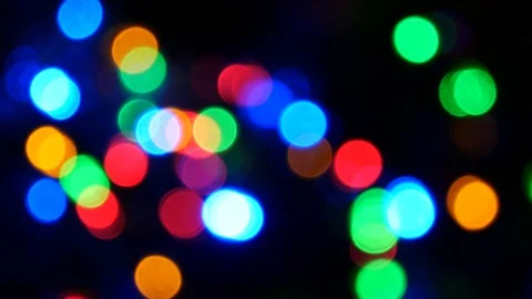 bright colored round lights on black bac... | Stock Video | Pond5