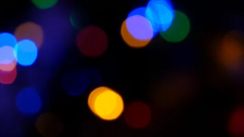 bright colored round lights on black bac... | Stock Video | Pond5