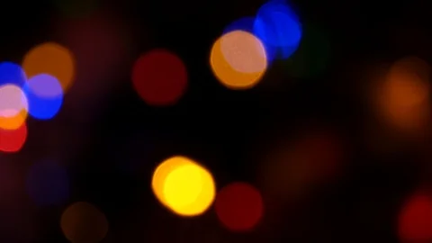 bright colored round lights on black bac... | Stock Video | Pond5
