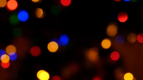 bright colored round lights on black bac... | Stock Video | Pond5