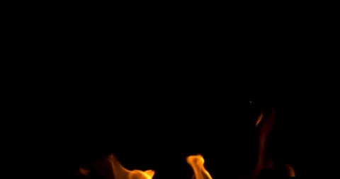 bright fire of a fire with sparks on a b... | Stock Video | Pond5
