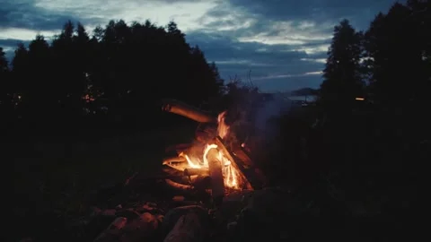 Bright flame of burning bonfire in dark ... | Stock Video | Pond5