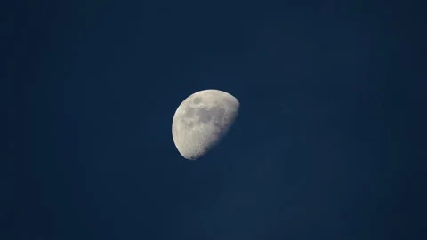 Bright full moon behind fast moving thin... | Stock Video | Pond5