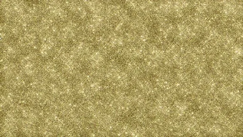 Bright gold shimmering glitter with spar... | Stock Video | Pond5