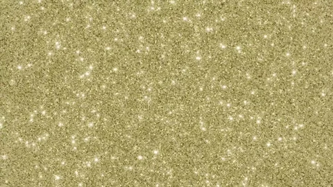 Bright gold shimmering glitter with spar... | Stock Video | Pond5