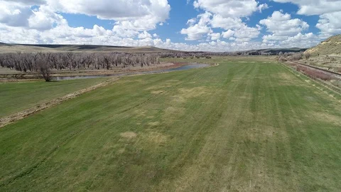 Bright, happy summer day ranch land flyo... | Stock Video | Pond5