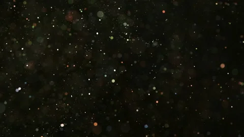 The bright particles flying on the dark ... | Stock Video | Pond5