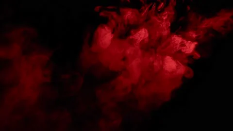 Bright red thick smoke on a black backgr... | Stock Video | Pond5