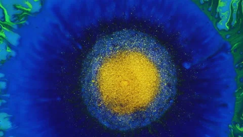 Bright yellow spot, a drop of paint, spr... | Stock Video | Pond5