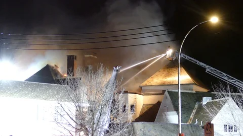 Brightly lit scene of a fire at old heri... | Stock Video | Pond5