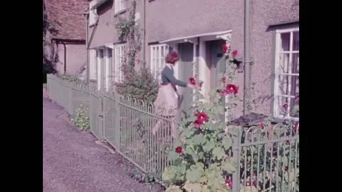 BRITAIN - 1976 - A boy and girl kiss the... | Stock Video | Pond5