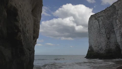 Britain. Ocean shore in between two rock... | Stock Video | Pond5