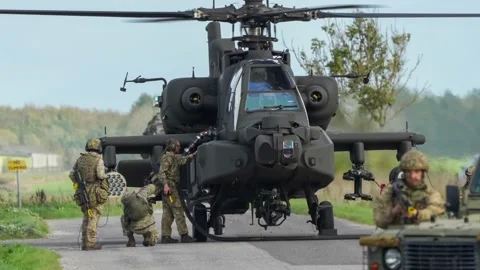 British army AH-64E Boeing Apache Attack... | Stock Video | Pond5