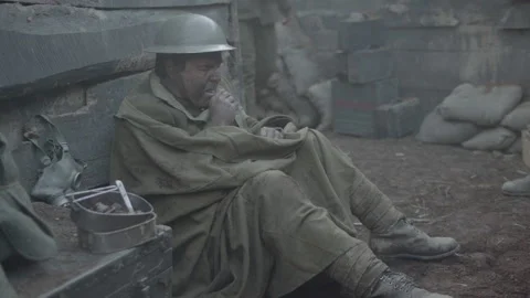 British soldiers in trenches eating duri... | Stock Video | Pond5