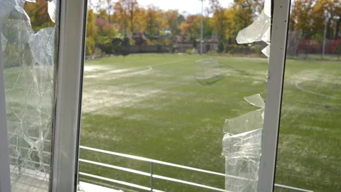 Broken glass of ruined commentator booth... | Stock Video | Pond5