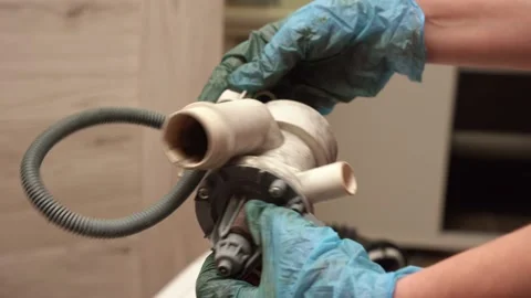 a broken old washing machine water pump ... | Stock Video | Pond5