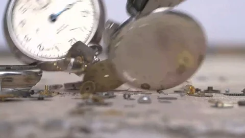 Broken pocket watches falling in slow mo... | Stock Video | Pond5