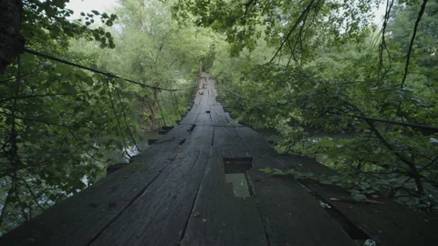 Broken rope bridge by spring morning 4K ... | Stock Video | Pond5
