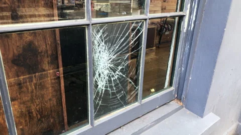 Smashed Shop Window Stock Footage ~ Royalty Free Stock Videos | Pond5