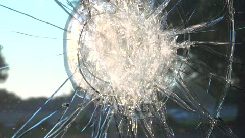 Rock Breaking Window Stock Footage ~ Royalty Free Stock Videos | Pond5