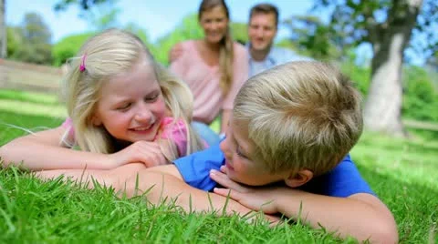Brother and sister tickling each other w... | Stock Video | Pond5