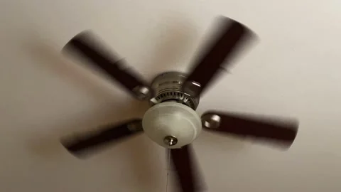 Brown Ceiling fan spinning with vintage ... | Stock Video | Pond5