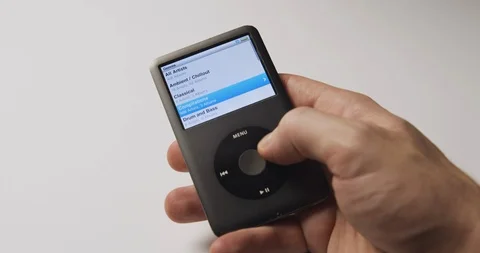 Browsing genres in old music player clos... | Stock Video | Pond5