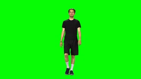 Brunette man walking on a Green Screen, ... | Stock Video | Pond5