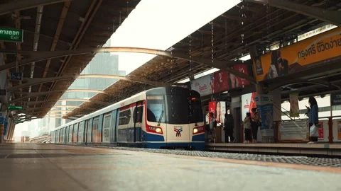 BTS skytrain arrives at the station duri... | Stock Video | Pond5