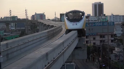 BTS yellow line skytrain above traffic i... | Stock Video | Pond5