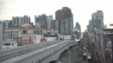 BTS yellow line skytrain above traffic i... | Stock Video | Pond5