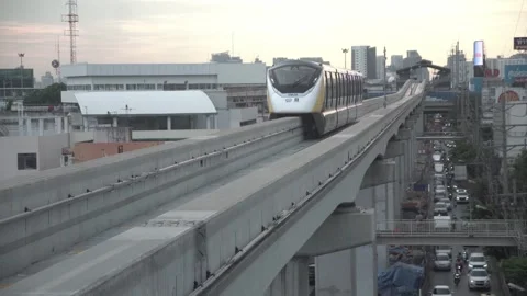 BTS yellow line skytrain above traffic i... | Stock Video | Pond5