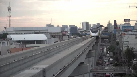 BTS yellow line skytrain above traffic i... | Stock Video | Pond5