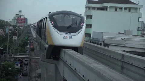 BTS yellow line skytrain above traffic i... | Stock Video | Pond5
