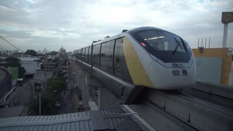 BTS yellow line skytrain above traffic i... | Stock Video | Pond5