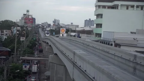 BTS yellow line skytrain above traffic i... | Stock Video | Pond5