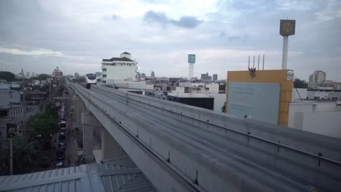 BTS yellow line skytrain above traffic i... | Stock Video | Pond5