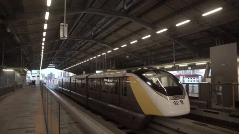 BTS yellow line skytrain above traffic i... | Stock Video | Pond5
