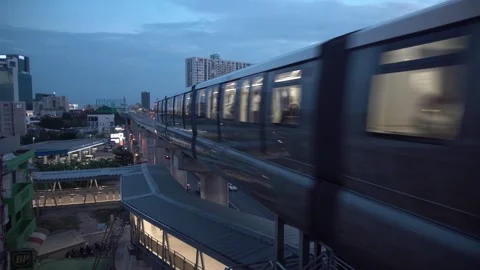 BTS yellow line skytrain above traffic i... | Stock Video | Pond5