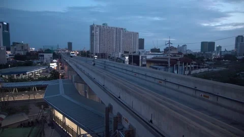 BTS yellow line skytrain above traffic i... | Stock Video | Pond5