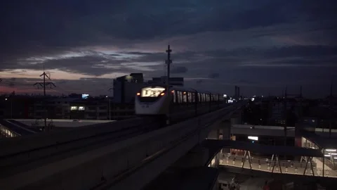BTS yellow line skytrain above traffic i... | Stock Video | Pond5