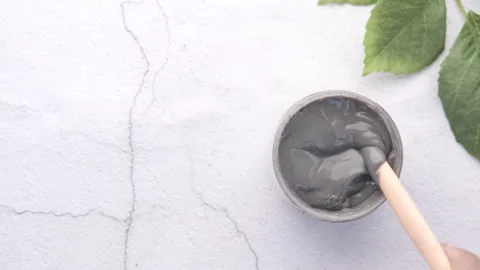 bubble clay mask in container on white b... | Stock Video | Pond5