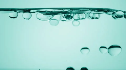 Bubbles float to the surface bouncing of... | Stock Video | Pond5
