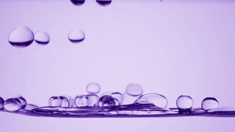 Bubbles float to surface bouncing off it... | Stock Video | Pond5