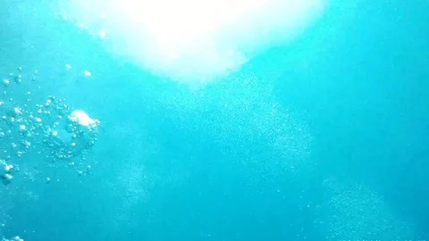 Bubbles rising to the surface from SCUBA... | Stock Video | Pond5