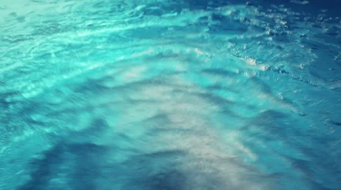 Bubbling blue water close shot | Stock Video | Pond5