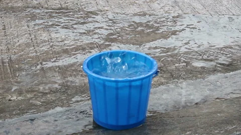 Rain Buckets Stock Footage ~ Royalty Free Stock Videos | Pond5
