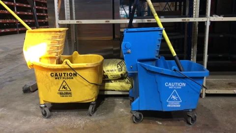 Buckets For Mops With Caution Wet Floor ... | Stock Video | Pond5