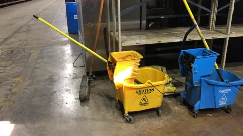 Buckets For Mops With Caution Wet Floor ... | Stock Video | Pond5
