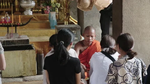 Buddhist Monk Giving Blessing inside Ang... | Stock Video | Pond5
